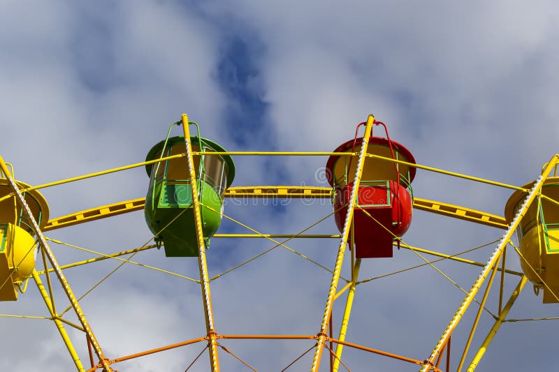 Attraction Carousel Ferris Wheel on the Background of the Cloudy Sky ...