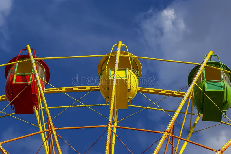 Attraction Carousel Ferris Wheel on the Background of the Cloudy Sky ...