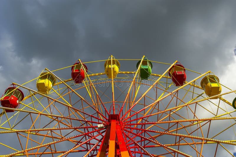 Attraction Carousel Ferris Wheel on the Background of the Cloudy Sky ...
