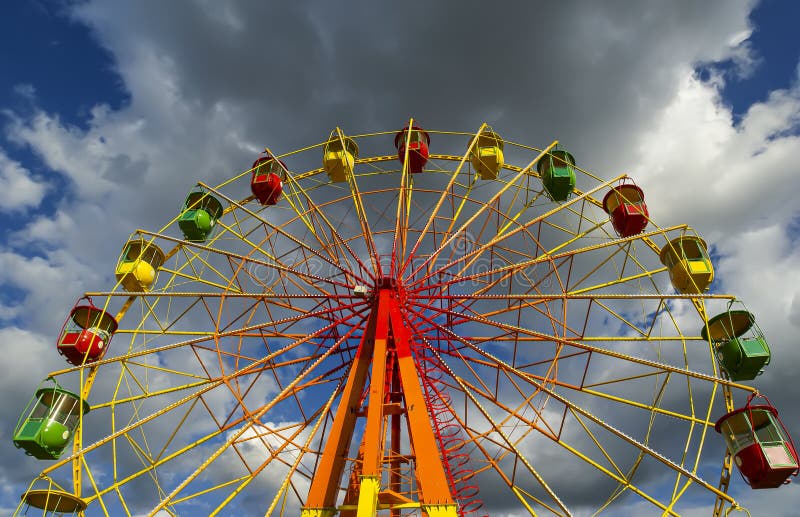 Attraction Carousel Ferris Wheel on the Background of the Cloudy Sky ...