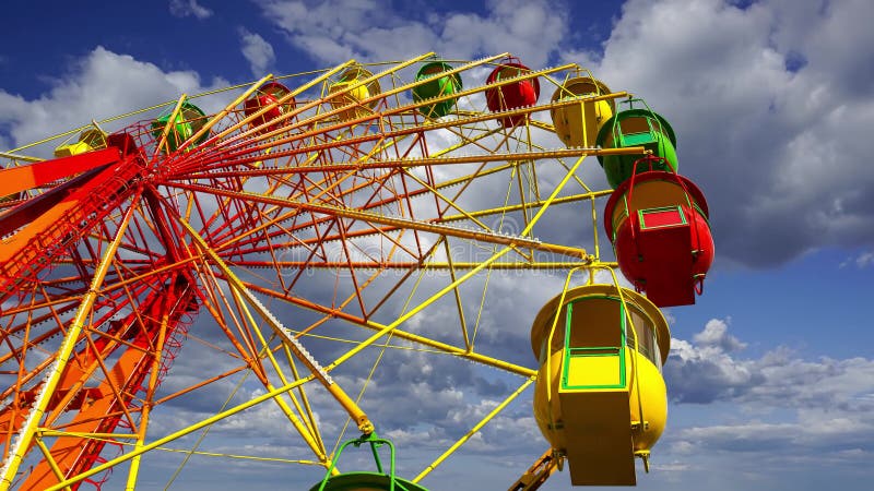 Attraction Carousel Ferris Wheel on the Background of the Cloudy Sky ...