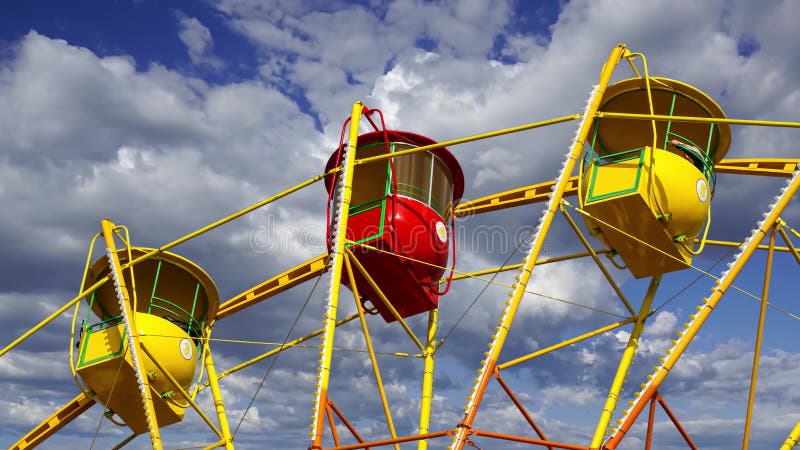 Attraction Carousel Ferris Wheel on the Background of the Cloudy Sky ...