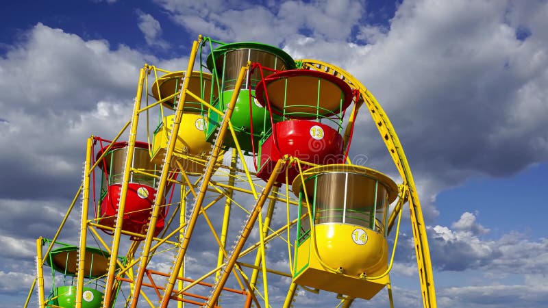 Attraction Carousel Ferris Wheel on the Background of the Cloudy Sky ...