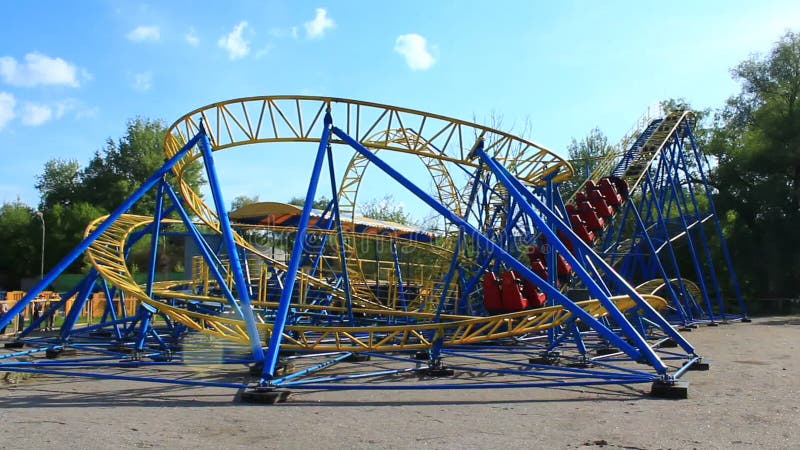 Attraction Roller-coaster Switchback on the Background of the Cloudy ...