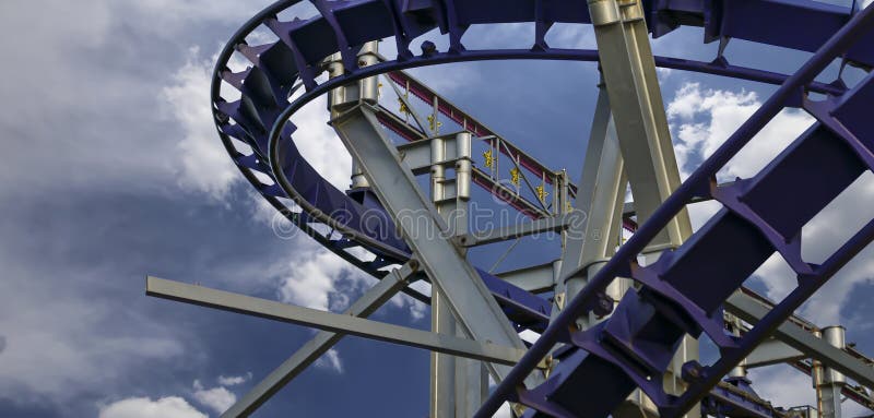 Attraction Roller-coaster Switchback on the Cloudy Sky Stock Image ...