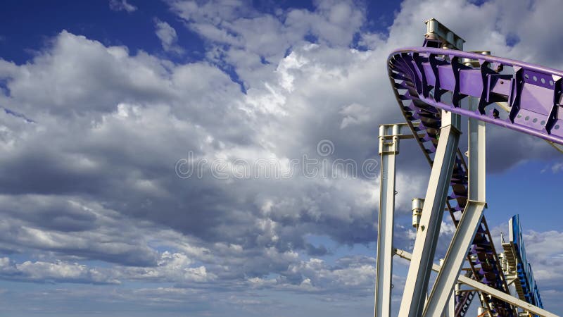 Attraction Roller-coaster Switchback on the Background of the Cloudy ...