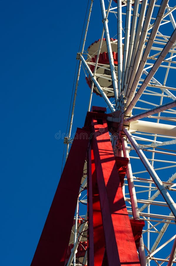Attractions in Spring City Park - Ferris Wheel Over Blue Sky Stock ...