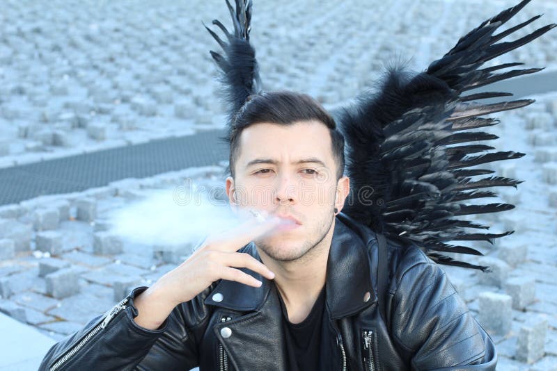 Attractive Angel Smoking a Cigarette Stock Photo - Image of angelic ...