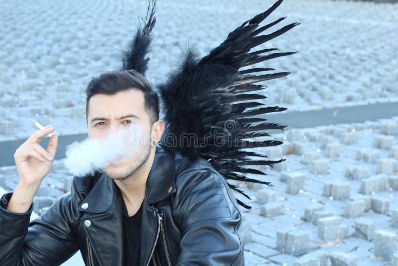 Attractive Angel Smoking a Cigarette Stock Photo - Image of demon ...