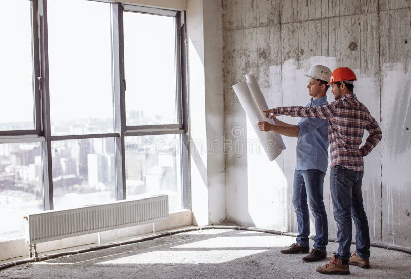 Attractive Architector and Engineer are Planning Their Work ...