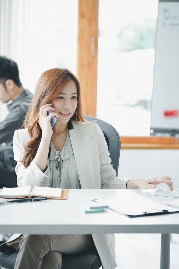 Attractive Asian Business People Working Together at Modern Office ...