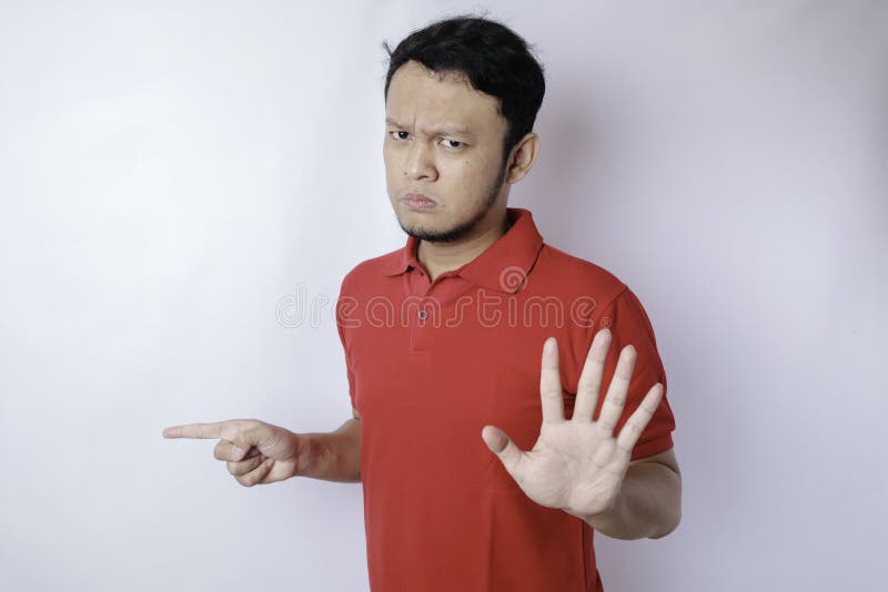 Attractive Asian Man With Hand Gesture Pose Rejection Or Prohibition