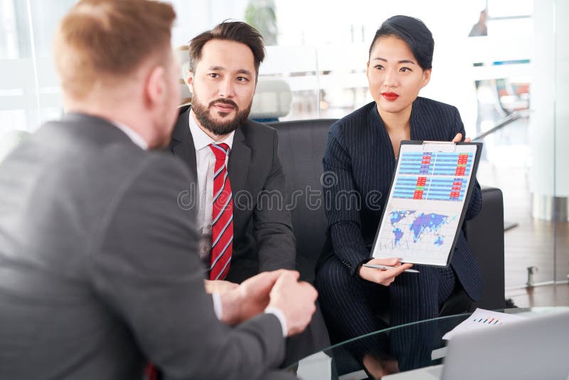 Analyzing Work Results with Colleagues Stock Photo - Image of partner ...