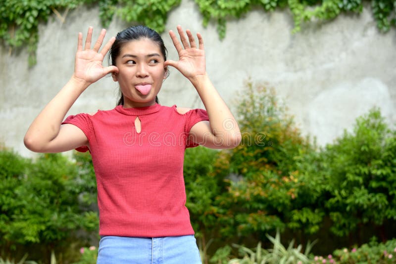 A Female Making Funny Faces Stock Image - Image of feelings, goofy ...