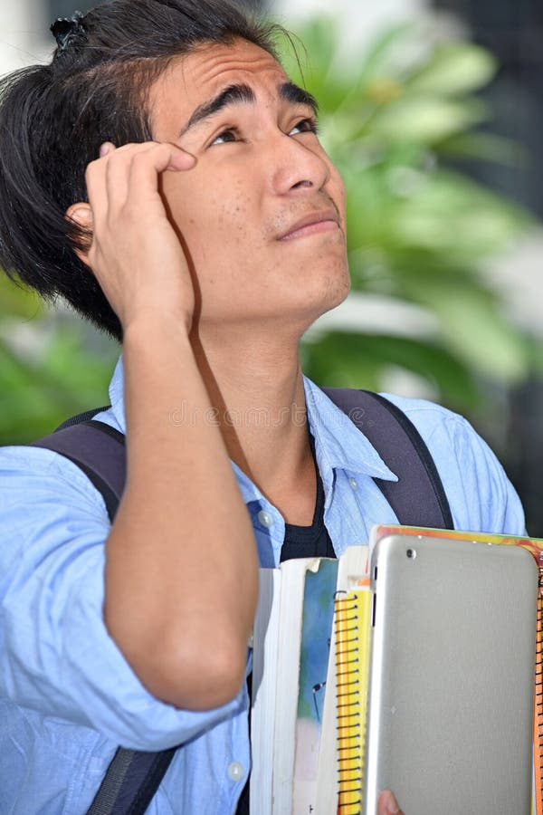 A Male Student Thinking stock photo. Image of pupil - 137654396