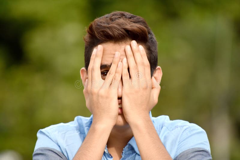 An Ashamed Diverse Male stock photo. Image of regret - 261288724