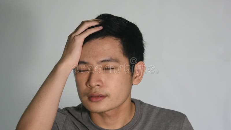 A Forgetful Asian Man Closeup Isolated Stock Footage - Video of forget ...