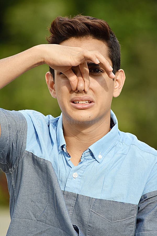 A Young Boy and Odor stock image. Image of young, smell - 261288733