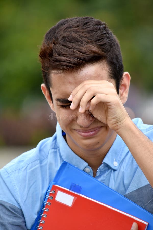 A Young Boy Student Crying stock image. Image of handsome - 261288299