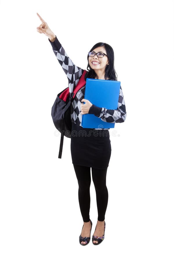 Attractive Asian Student Pointing at Copyspace Stock Image - Image of ...