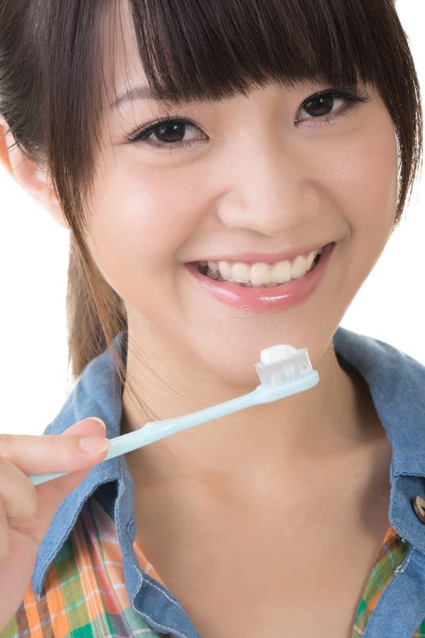 Attractive Asian Young Woman Using Toothbrush Stock Image - Image of ...