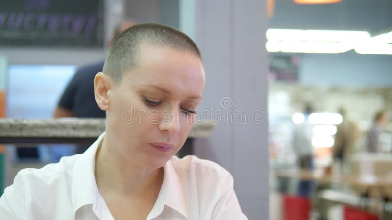Attractive Bald Woman Has Lunch or Dinner in a Restaurant Stock Video ...