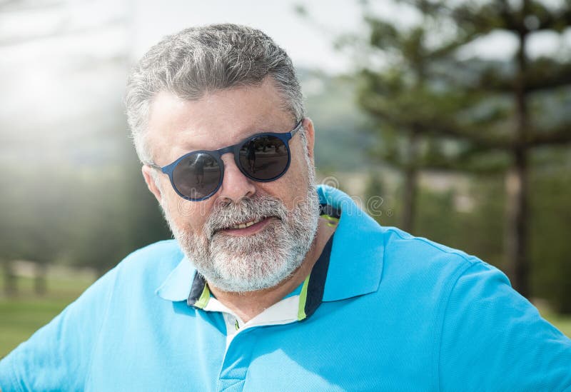 Attractive Bearded Man on a Golf Course Stock Photo - Image of handsome ...