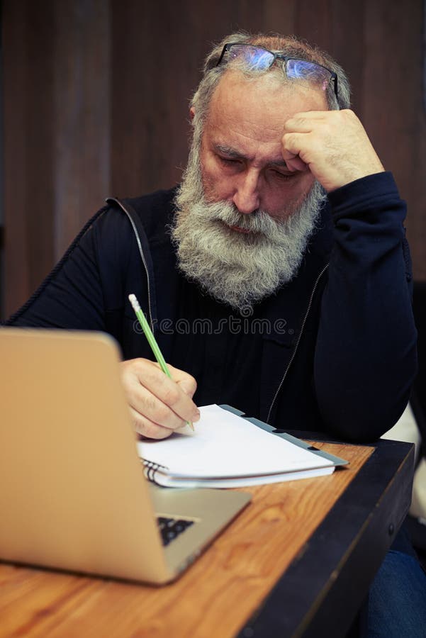 Attractive Bearded Senior Taking Notes Stock Image - Image of indoor ...