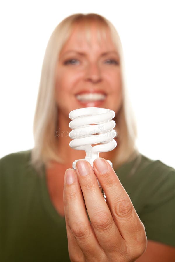 Attractive Blonde Woman Holds Energy Saving Light Stock Photo - Image ...