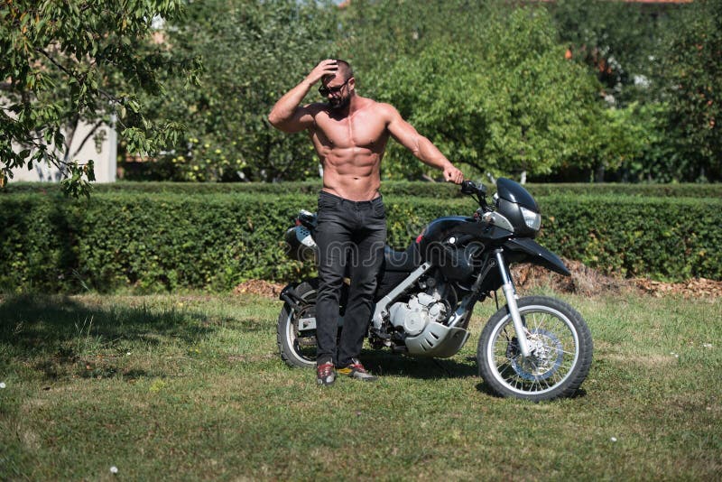 Attractive Bodybuilder and Motorcycle Stock Photo - Image of beard ...