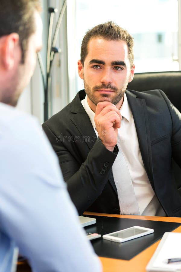Attractive Boss Doing Interview with His Assistant Stock Photo - Image ...