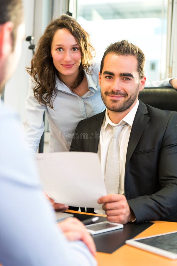 Attractive Boss Doing Interview with His Assistant Stock Photo - Image ...