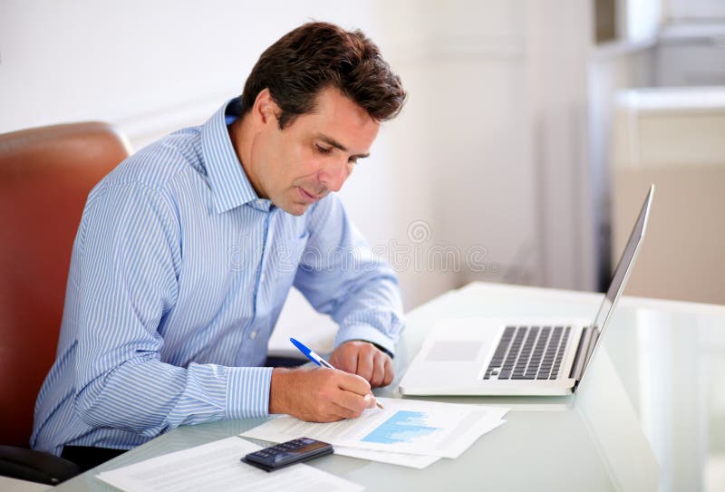 Attractive Boss Working on His Documents Stock Photo - Image of sitting ...