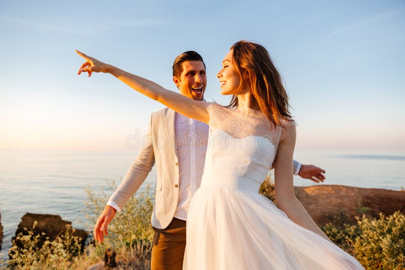 Attractive Bride and Groom Getting Married by the Beach Stock Image ...
