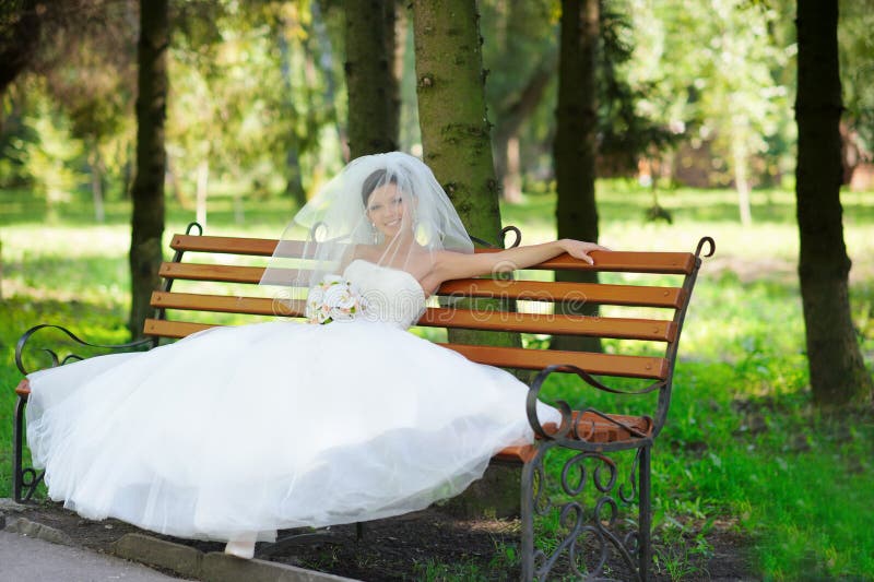 Attractive Bride Sitting on the Bench Stock Photo - Image of love ...