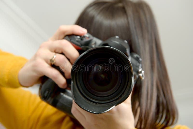Attractive Brunette Woman with Photo Camera in Studio Stock Photo ...