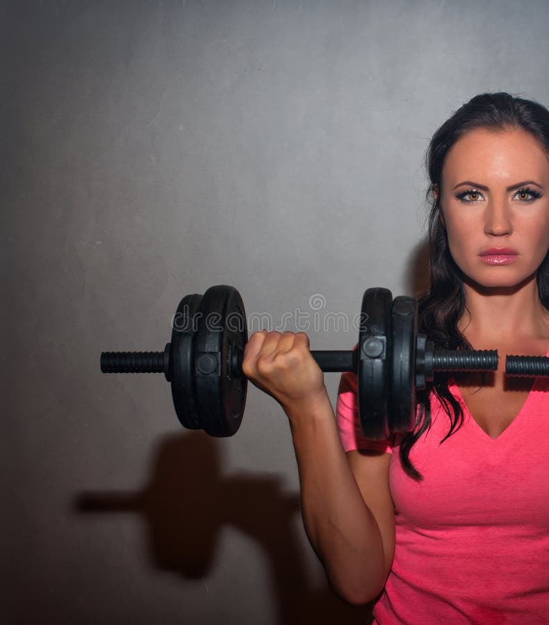 Attractive Brunette Woman Working Out. Stock Image - Image of muscular ...
