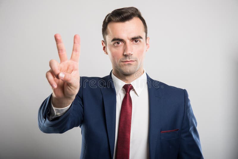 Attractive Business Man Showing Number Two Gesture Stock Photo - Image ...