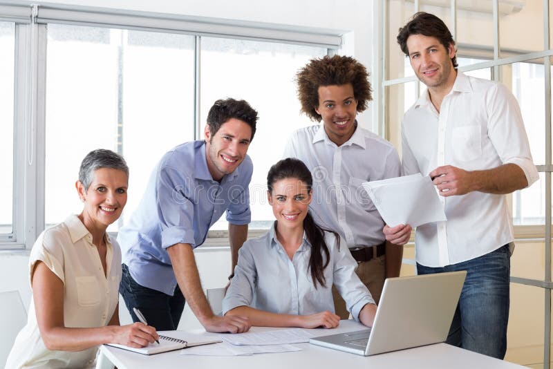 Attractive Business People Smiling In The Workplace Stock Photo - Image ...