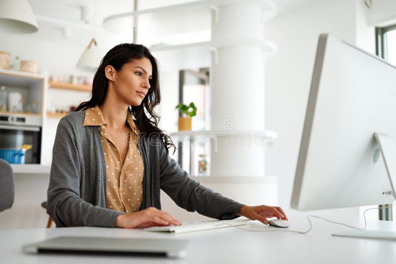 Attractive Business Woman Working on Computer. Business Technology ...
