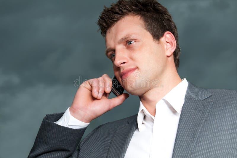 Attractive businessman stock image. Image of smiling - 10975859
