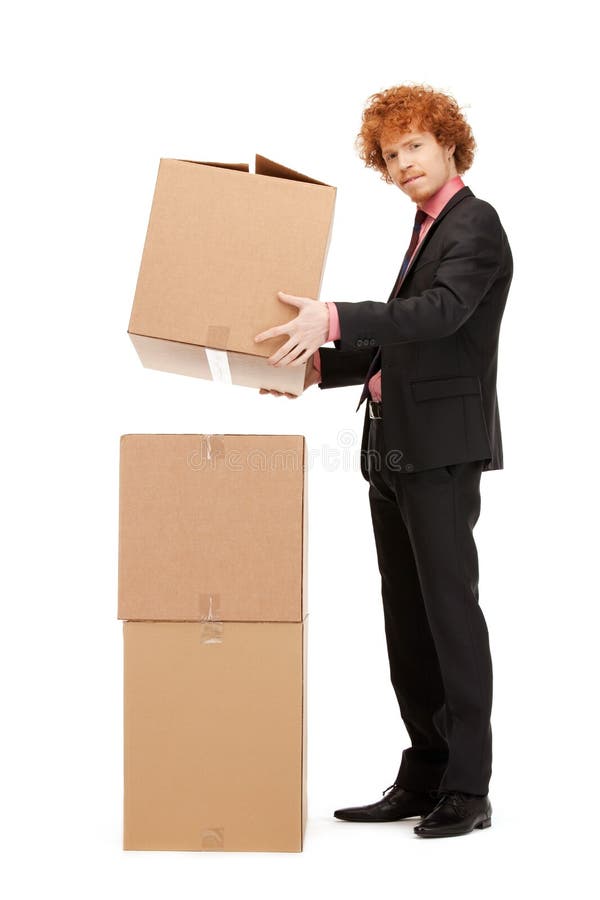 Attractive Businessman with Big Boxes Stock Image - Image of containers ...