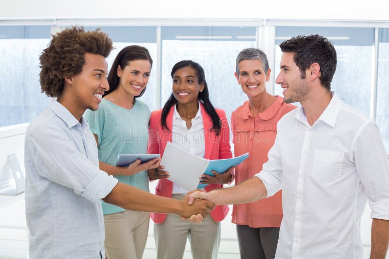 Attractive Businessmen Shaking Hands at Work Stock Image - Image of ...