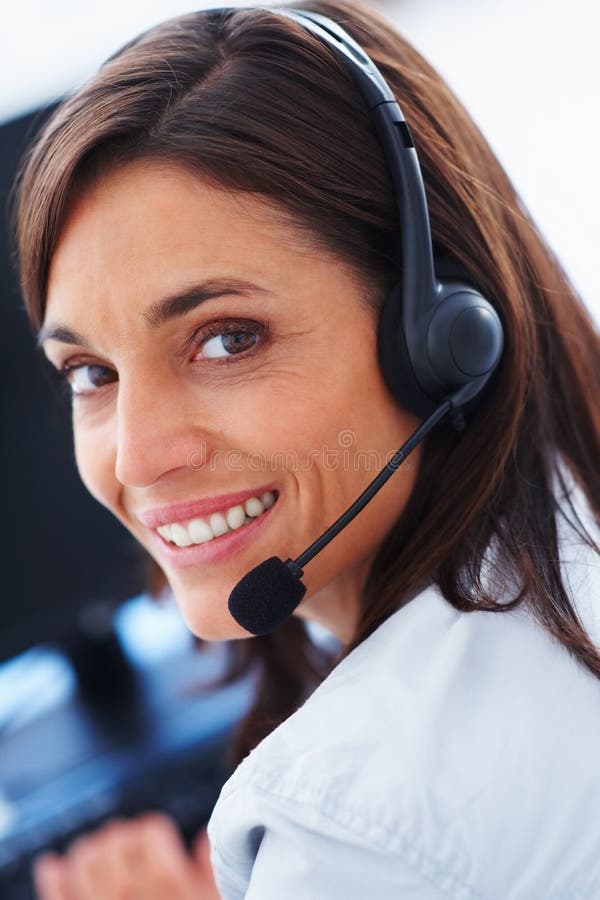 Attractive Call Center Executive Smiling Stock Photo - Image of ...