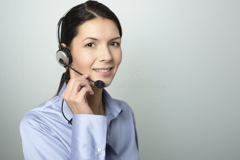 Attractive Call Center Operator Wearing a Headset Stock Photo - Image ...