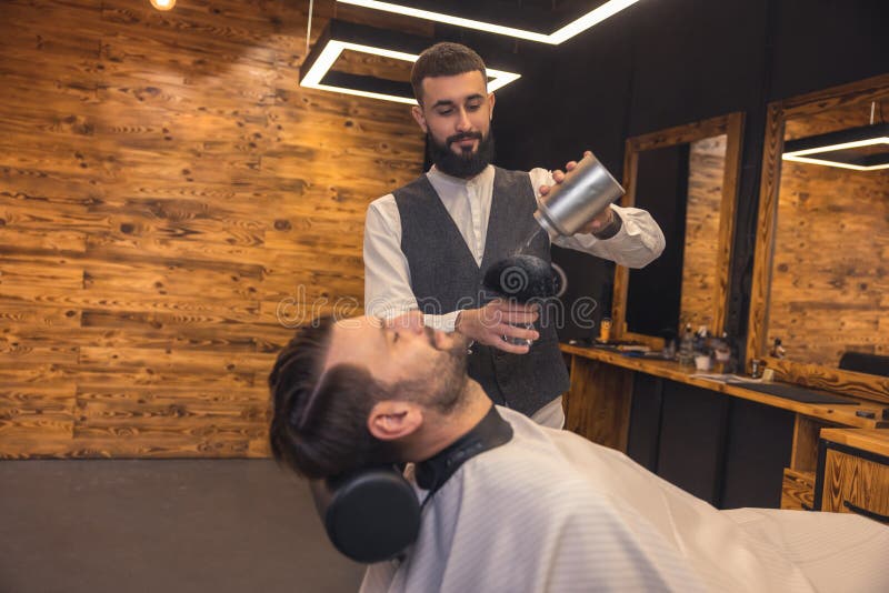 Caucasian Man Getting Perfect Shape of Beard at Barbershop. Stock Photo ...
