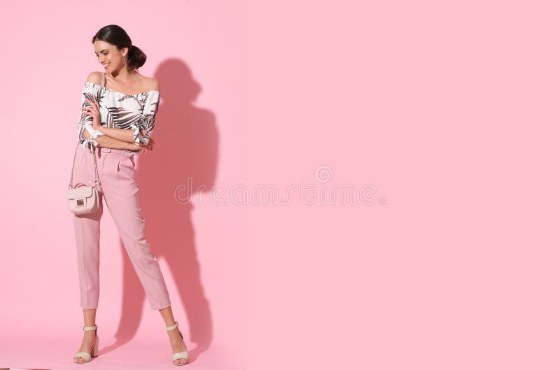 Attractive Model Well Dressed Posing in Studio. Pink Outfit. Stock ...