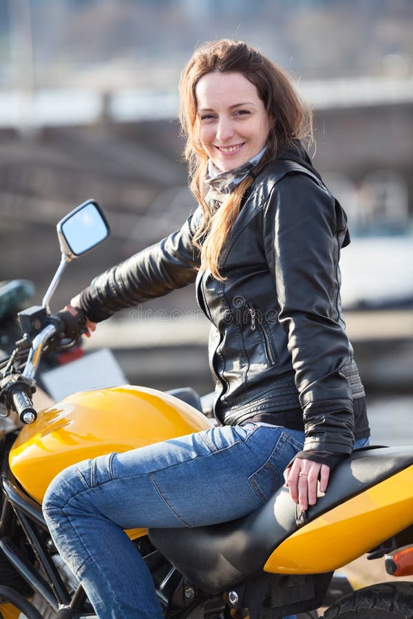 Attractive Woman with Her Motorcycle, Looking at Camera Stock Image ...