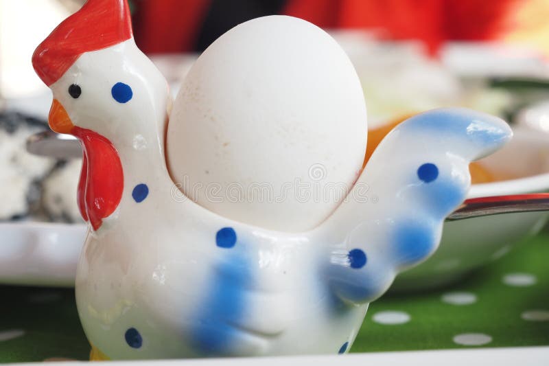Attractive Ceramic Chicken Egg Holder Featuring a White Egg Stock Image ...