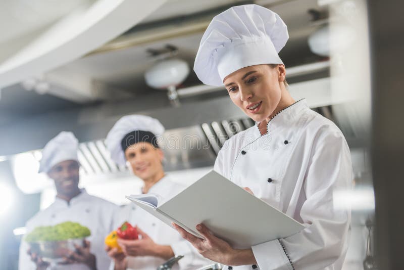 Attractive Chef Reading Recipe Stock Image - Image of multiethnic ...